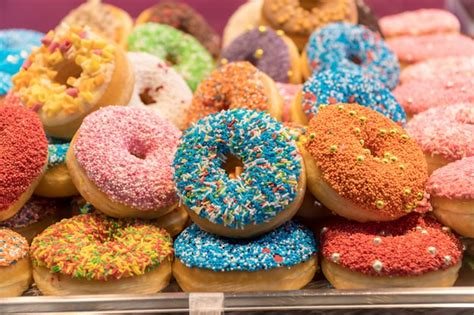 Premium Photo Colorful Assorted Donuts