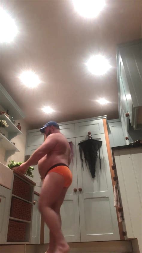ENM Bear Wears Orange Speedo After Losing Bet ThisVid Com