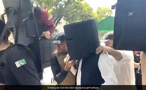 Watch Imran Khan Appears In Court Wearing A Bulletproof Bucket Over His Head