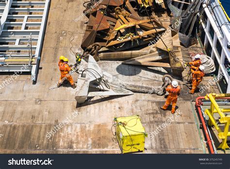 Offshore Workers Handling Anchor Be Lifted Stock Photo Edit Now 375245749 Shutterstock