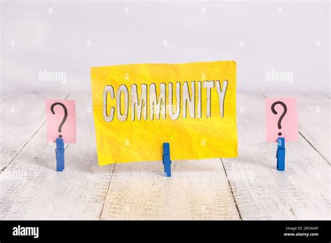 Writing Note Showing Community Business Concept For Specific Population With A Common