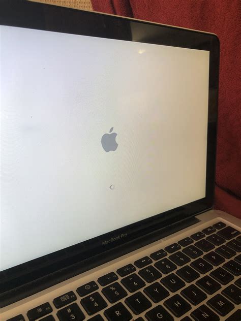 MacBook Pro Stuck On Loading Screen Wont Get Past The White Screen With The Apple Logo