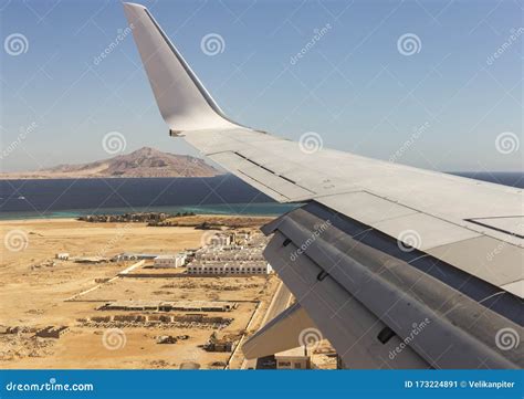 The Plane Lands On The Airfield Spoilers And Flaps Trailing Edge When