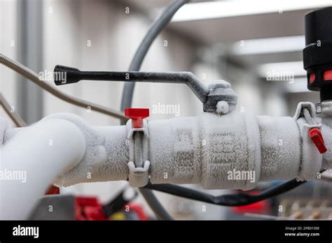 Frozen Liquid Nitrogen Pipeline And Faucet Inside Science Lab Close Up Shot Shallow Depth Of