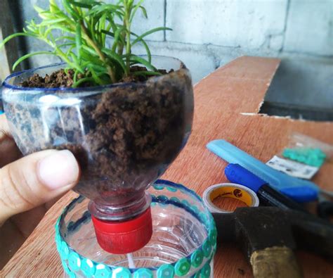 Upcycled Plastic Bottle Into Self Watering Planter 6 Steps With