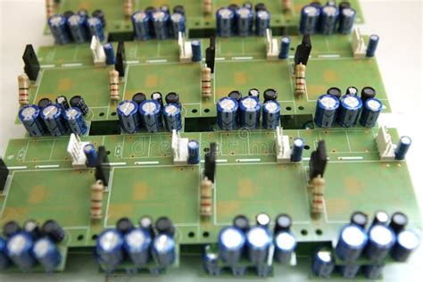 A Man Collects A Printed Circuit Board The Worker Solders The Radio