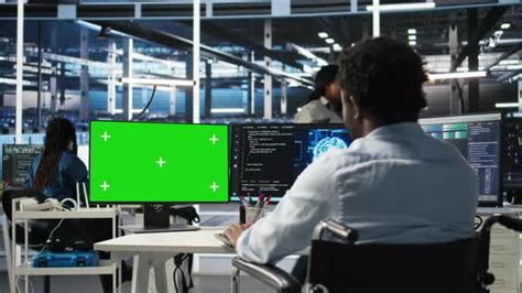 Data Center Admin In Wheelchair Using Ai Node Tree Software On Green