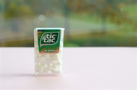 Many Tic Tac Candy Packages On Green Wood Background Tic Tac Is Popular Due Its Minty Fresh