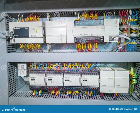 Mitsubishi Plc Modules In A Row In Electrical Cabinet Of Automation Control System On Industrial
