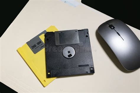 Old 3 And A Half Inch Floppy Disks On A Manila Folder Editorial Stock
