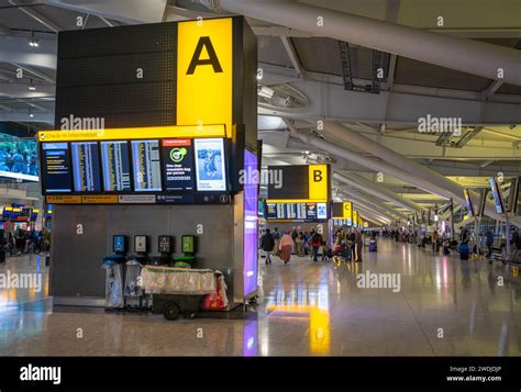 Information Boards And Zone Markers In The Check In Area In The Departures Hall At Heathrow