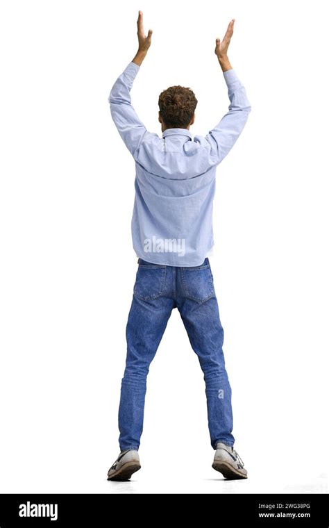 a man in a blue shirt on a white background full length jumps stock