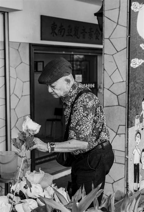 Greyscale Photo Of Man Wearing Flat Cap Photo Free Person Image On