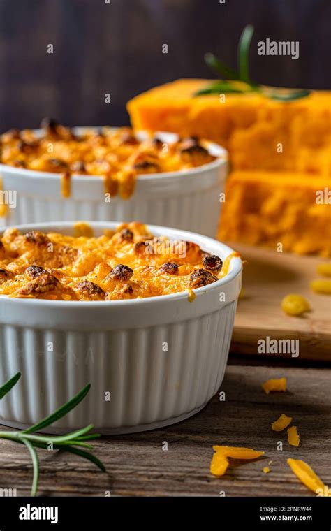 Baked Macaroni And Cheese In Individual Small Round Dishes Close Up