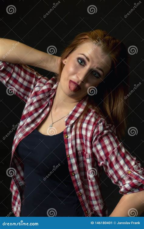 Portrait Of Young Woman Sticking Tongue Out On Camera Stock Image Image Of Attractive Cool