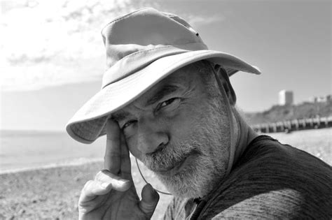 Premium Photo Portrait Of Man Wearing Hat Outdoors