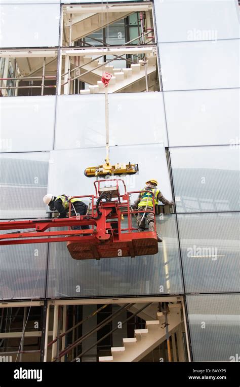Construction Workers Installing New Windows Window Hi Res Stock Photography And Images Alamy
