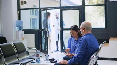 Premium Photo Senior Man Doing Diabetes Rutine Control With Glucometer Instrument Nurse