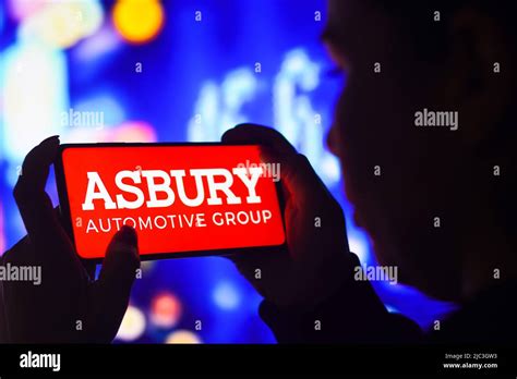 In This Photo Illustration A Silhouetted Woman Holds A Smartphone With