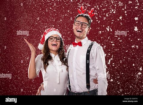 Happy Nerd Couple Surrounded In Snowflakes Debica Poland Stock Photo Alamy