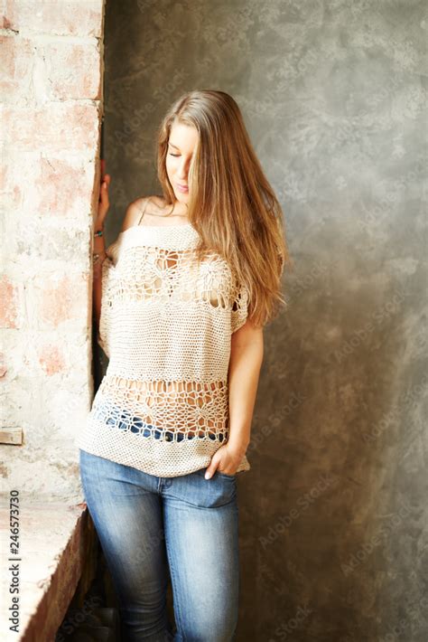 Beautiful Russian Girl Posing For Photo In The Home Loft Studio Stock Photo Adobe Stock