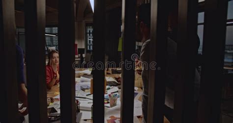 Diverse Business Team Collaborating In Modern Office Using Sticky Notes