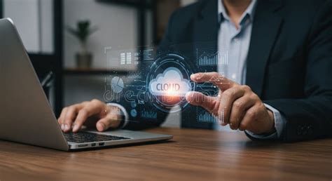 Business Analyst Reviews Cloud Computing Data With Holographic Charts