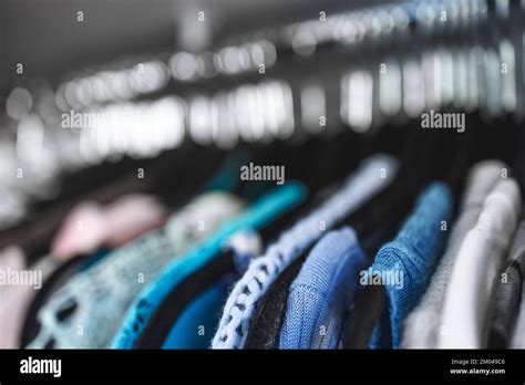 organizing and tidying up conceptual still life wardrobe with colour