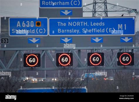 signs and variable speed limits 60mph above each lane of the m1