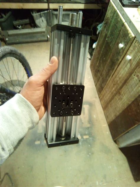 few pics of my first diy cnc built from scrap material s with little knowledge and huge