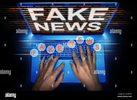 A Hacker Spreading Fake News From A Computer Stock Photo Alamy