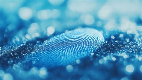 Close Up Of Blue Fingerprint On Wet Surface Concept Of Identity Security And Biometrics Stock