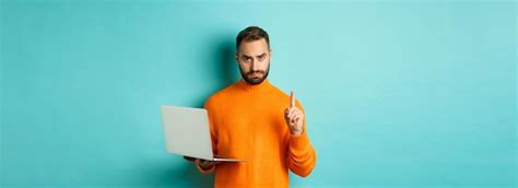 Man Pointing On Laptop Images Free Download On Freepik