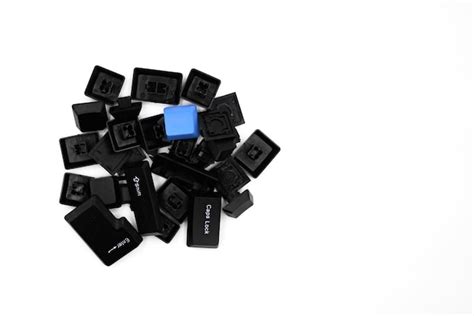 Premium Photo A Pile Of Random Computer Keyboard Keys Isolated On A White Background