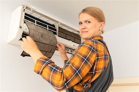 Premium Photo Female Master And Air Conditioner Air Conditioner Repair