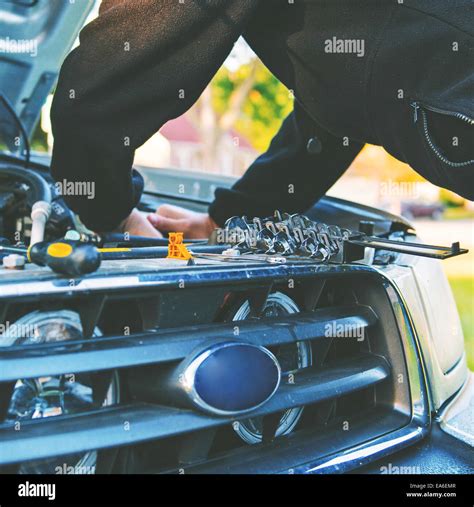 Man Fixing Car Engine Stock Photo Alamy