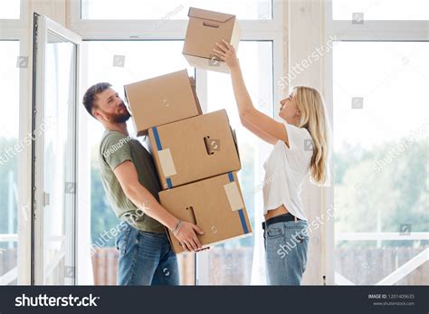 1 932 Blonde Man Moving Boxes Images Stock Photos Vectors Shutterstock