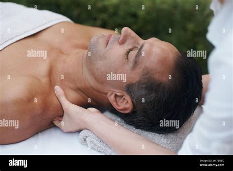 Removing His Tension One Knot At A Time A Handsome Man Enjoying A