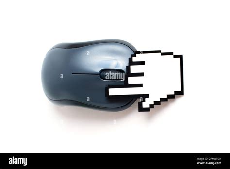 Large Pixel Hand Mouse Pointer Shaped Figurine Clicks On A Computer