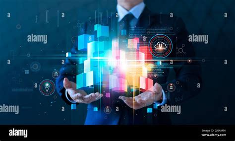 A Businessman Holding Blockchain Network And Cloud Computing Online