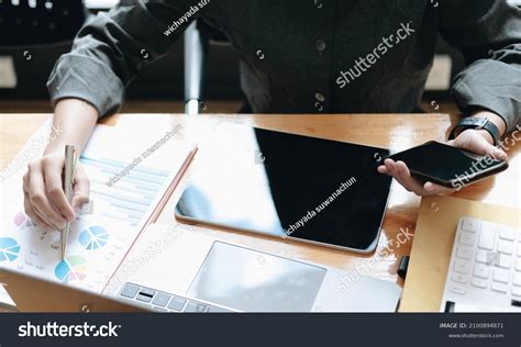 Woman Pen Pointing Graph Chart This Stock Photo 2100894871 Shutterstock