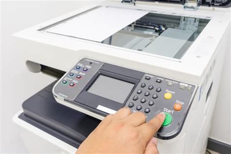 Premium Photo Man Copying Paper From Photocopier With Access Control For Scanning Key Card
