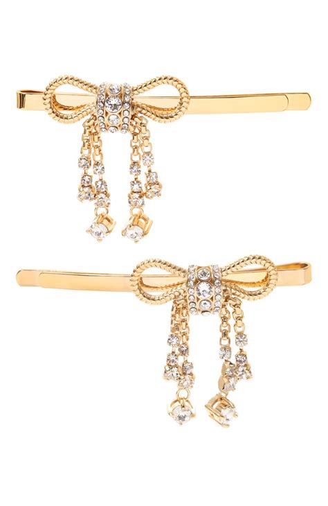 Женская золотая комплект из двух заколок для волос Miu Miu купить в интернет магазине ЦУМ арт