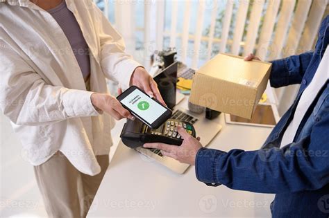 Woman Customer Using QR Code Payment Via Smartphone For Paying At Shop 21697959 Stock Photo At