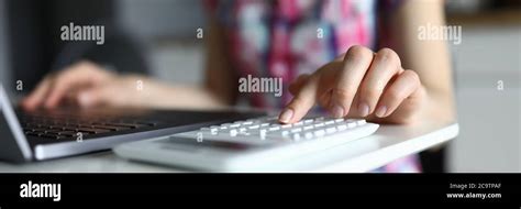 Female Hand Push Button On White Calculator Closeup Stock Photo Alamy
