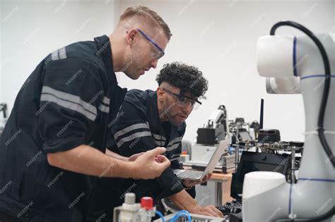 Premium Photo Robotics Control Engineers Solve Problems And Setting