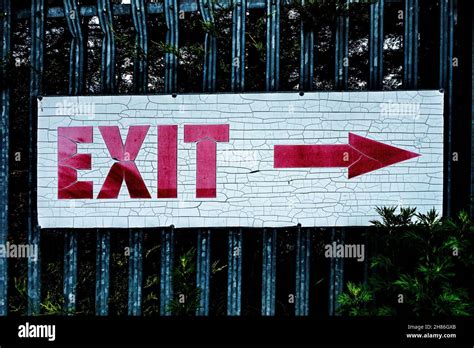 Exit Sign Mounted On Security Railings Stock Photo Alamy