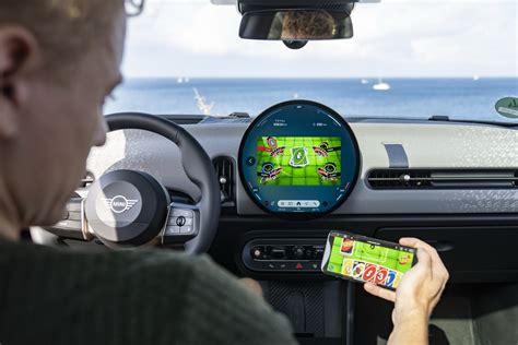 MINI Cooper C Offering In Car Gaming When Stationary Via Round OLED Display Autoevolution