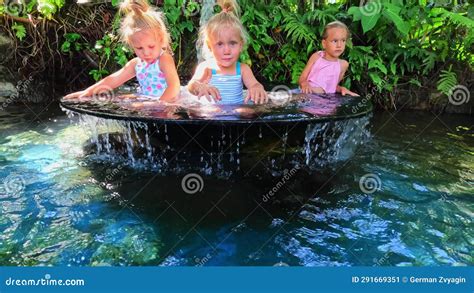 Little Sisters Triplets In The Water 4 5 Years Old Stock Video Video Of Girl Leisure 291669351