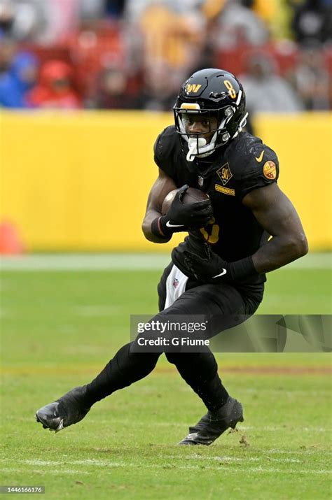 Brian Robinson Jr 8 Of The Washington Commanders Runs With The Ball